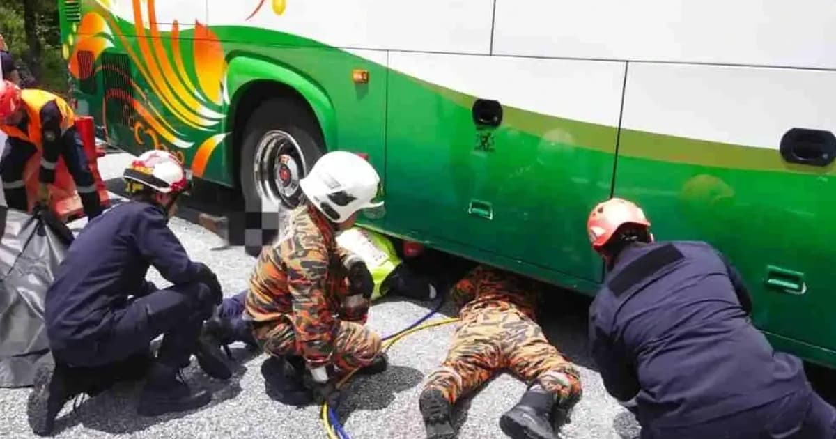 Teen motorcyclist dies after being trapped under bus | FMT