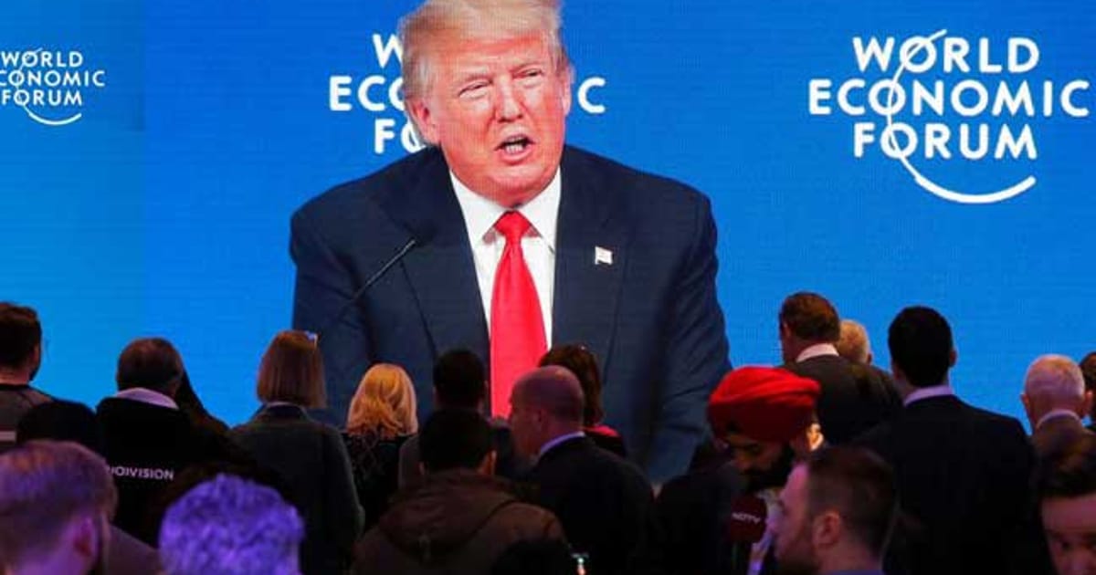 Boos and brass band greet Trump in Davos | FMT