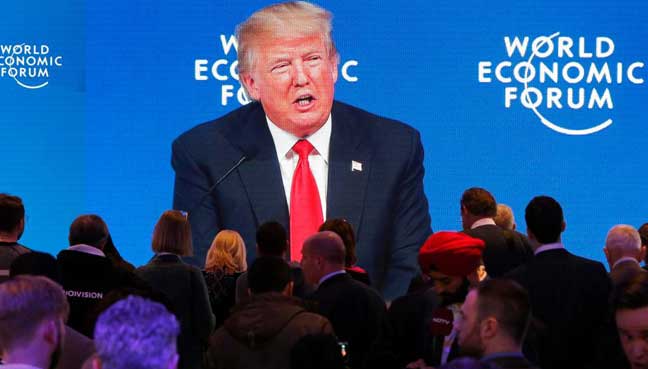 Boos and brass band greet Trump in Davos | FMT